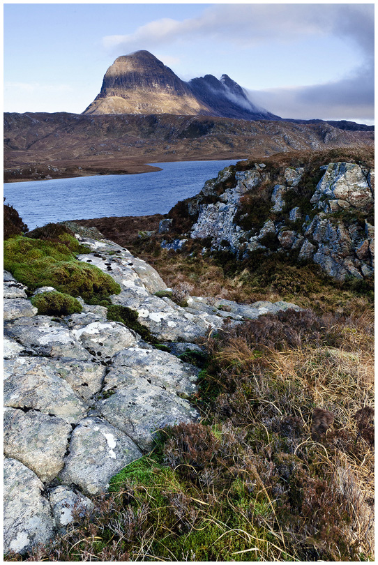 Suilven in an arc of cloud